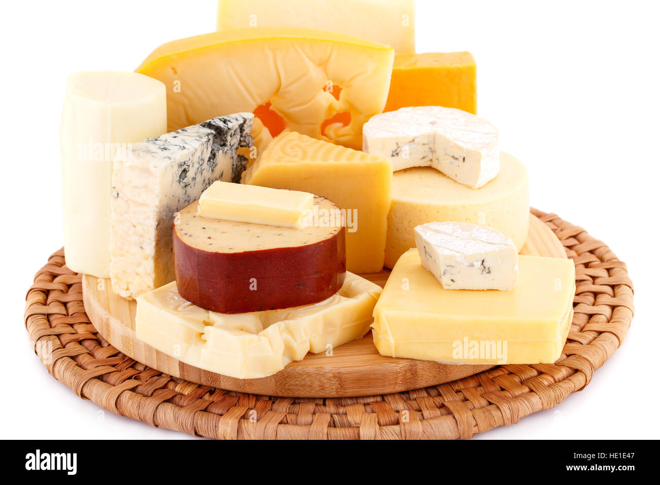 Various type of cheese on wooden board closeup picture Stock Photo - Alamy