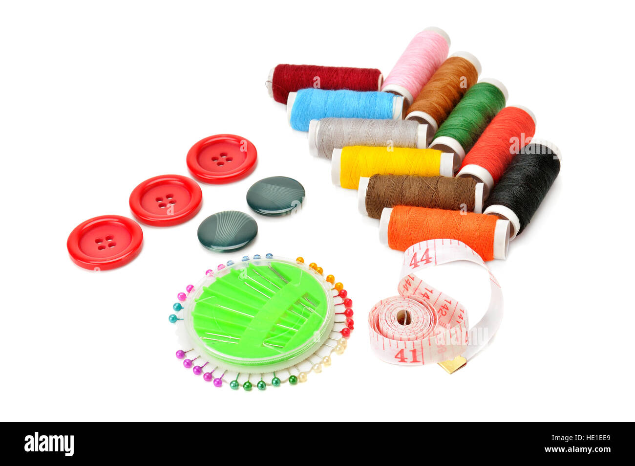 thread and buttons isolated on white background Stock Photo - Alamy