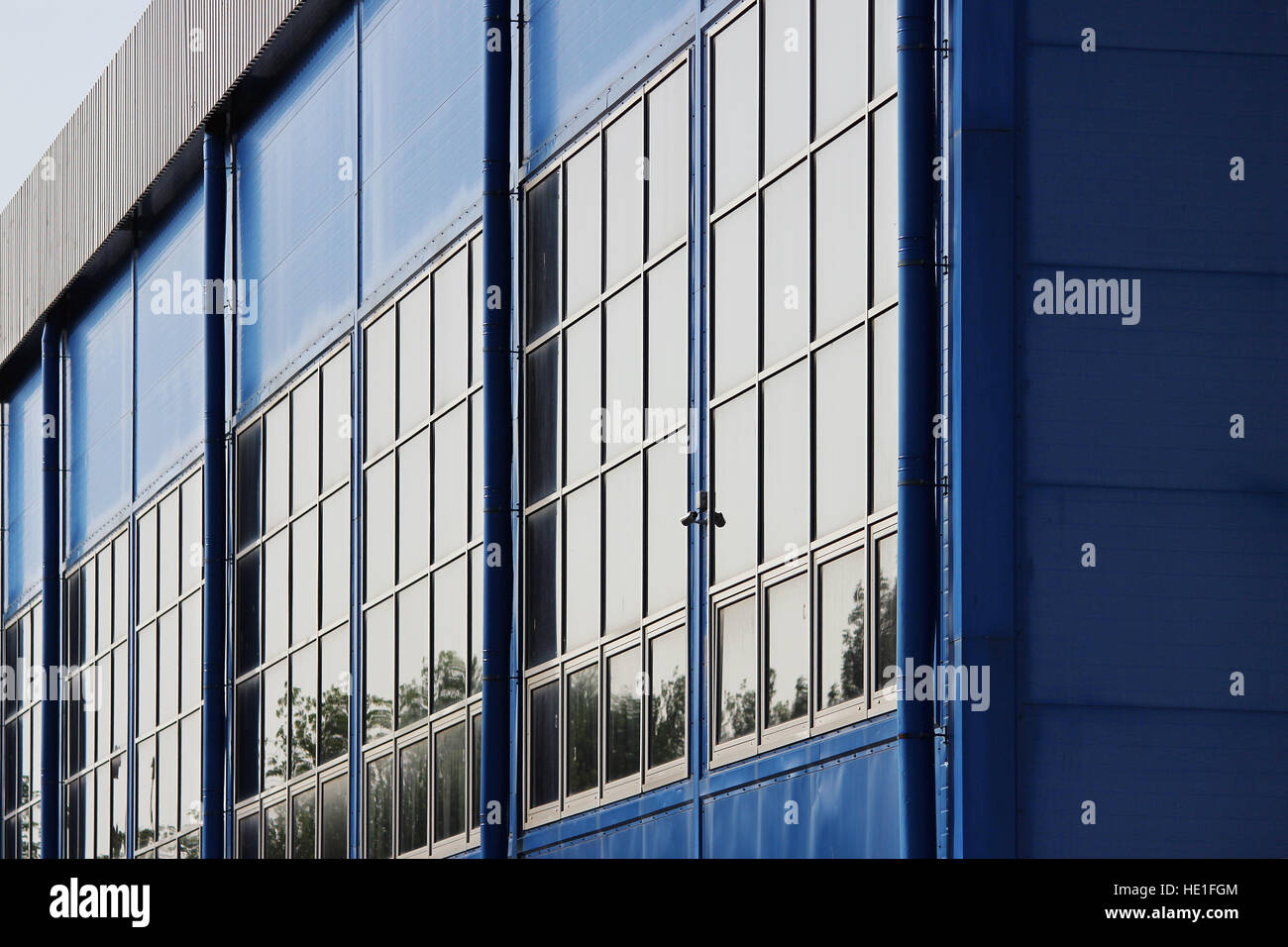 large sports complex. big blue building with many windows Stock Photo ...