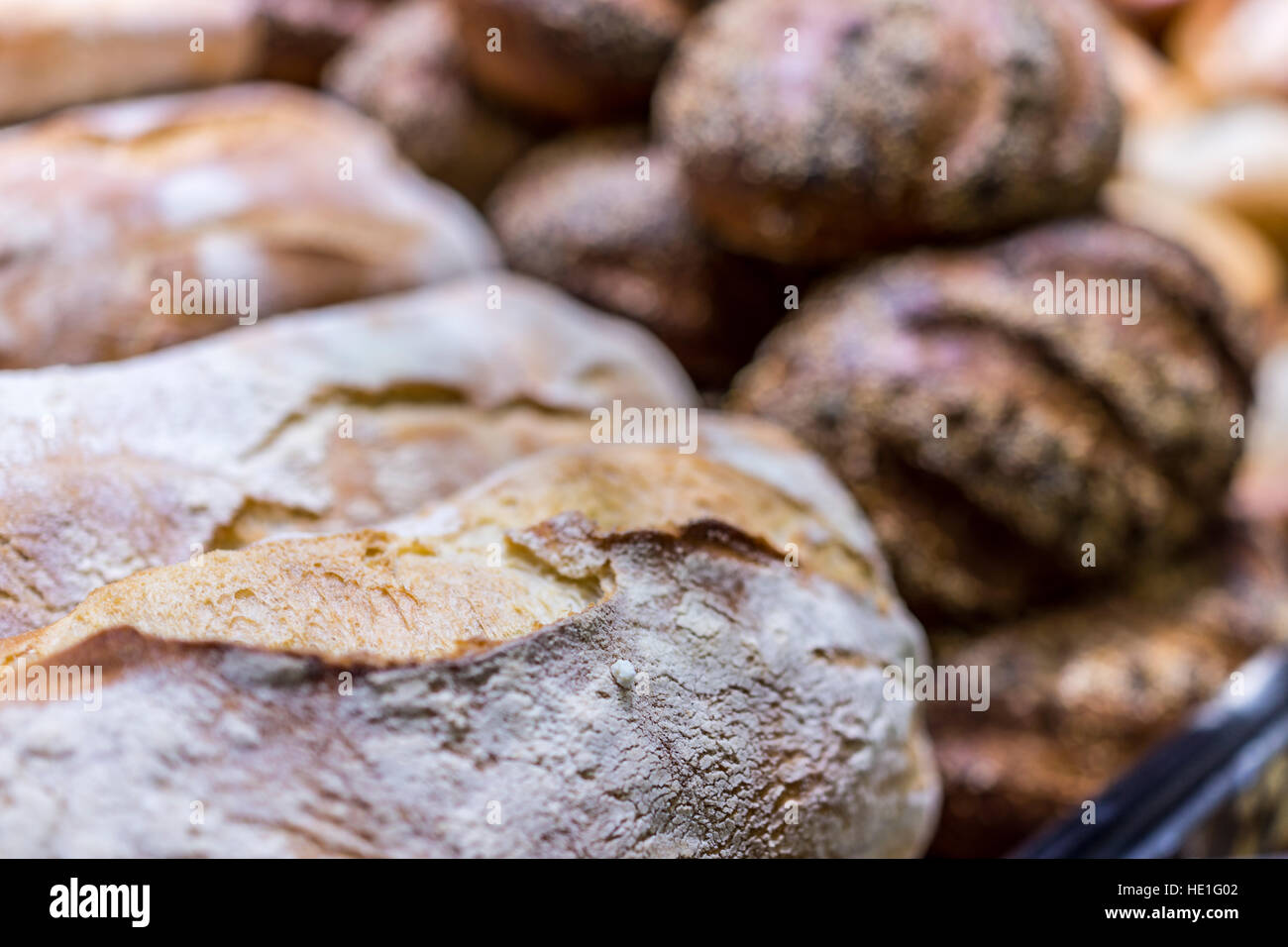 Fresh baked rustic bread display at bakery Stock Photo - Alamy