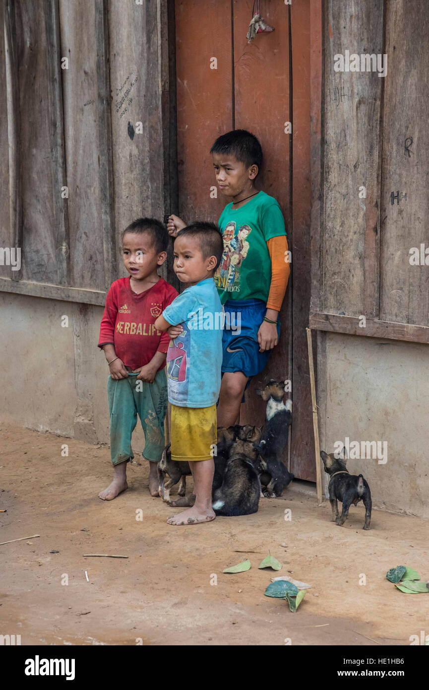 River scenery on the Mekong River Young children at a village on the ...