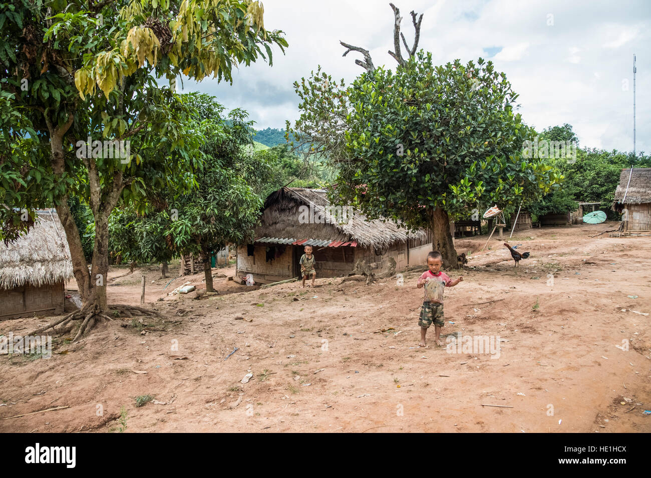 River scenery on the Mekong River Young children at a village on the ...