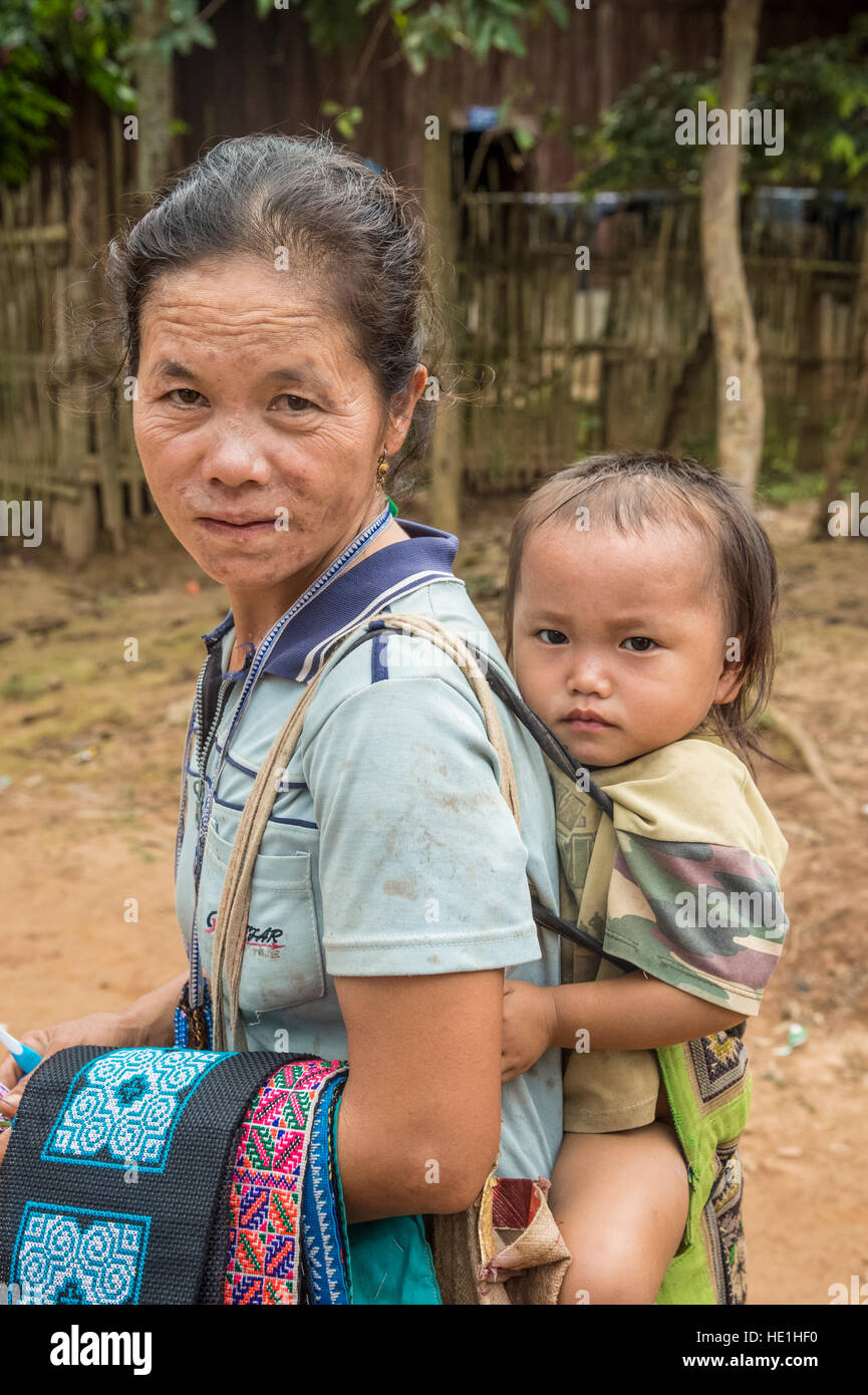 River scenery on the Mekong River Young children at a village on the ...
