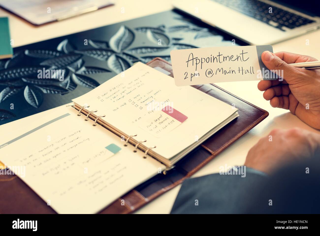 Business Man Holding Appointment Note Concept Stock Photo - Alamy