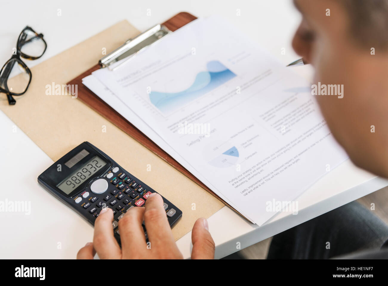 Business Man Studying Graph Report Concept Stock Photo - Alamy