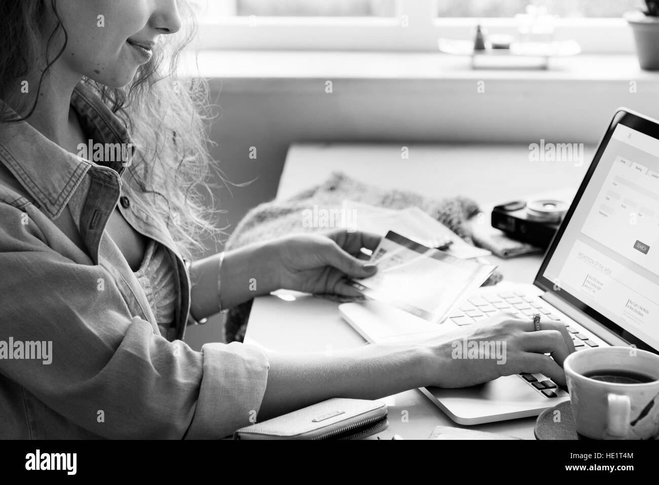 Booking credit Black and White Stock Photos & Images - Alamy