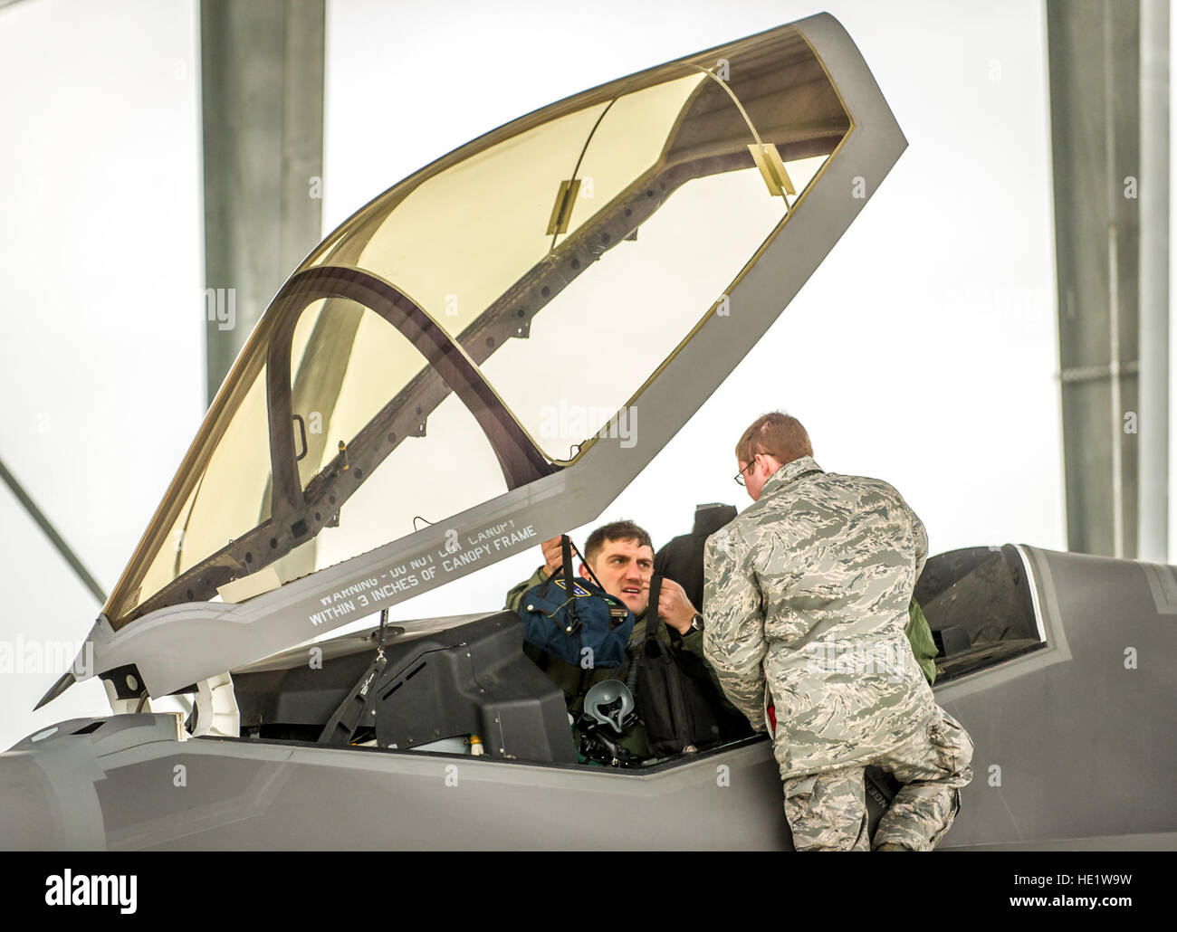 Maj. Ethan Sabin of the 31st Test and Evaluation Squadron, hands his ...