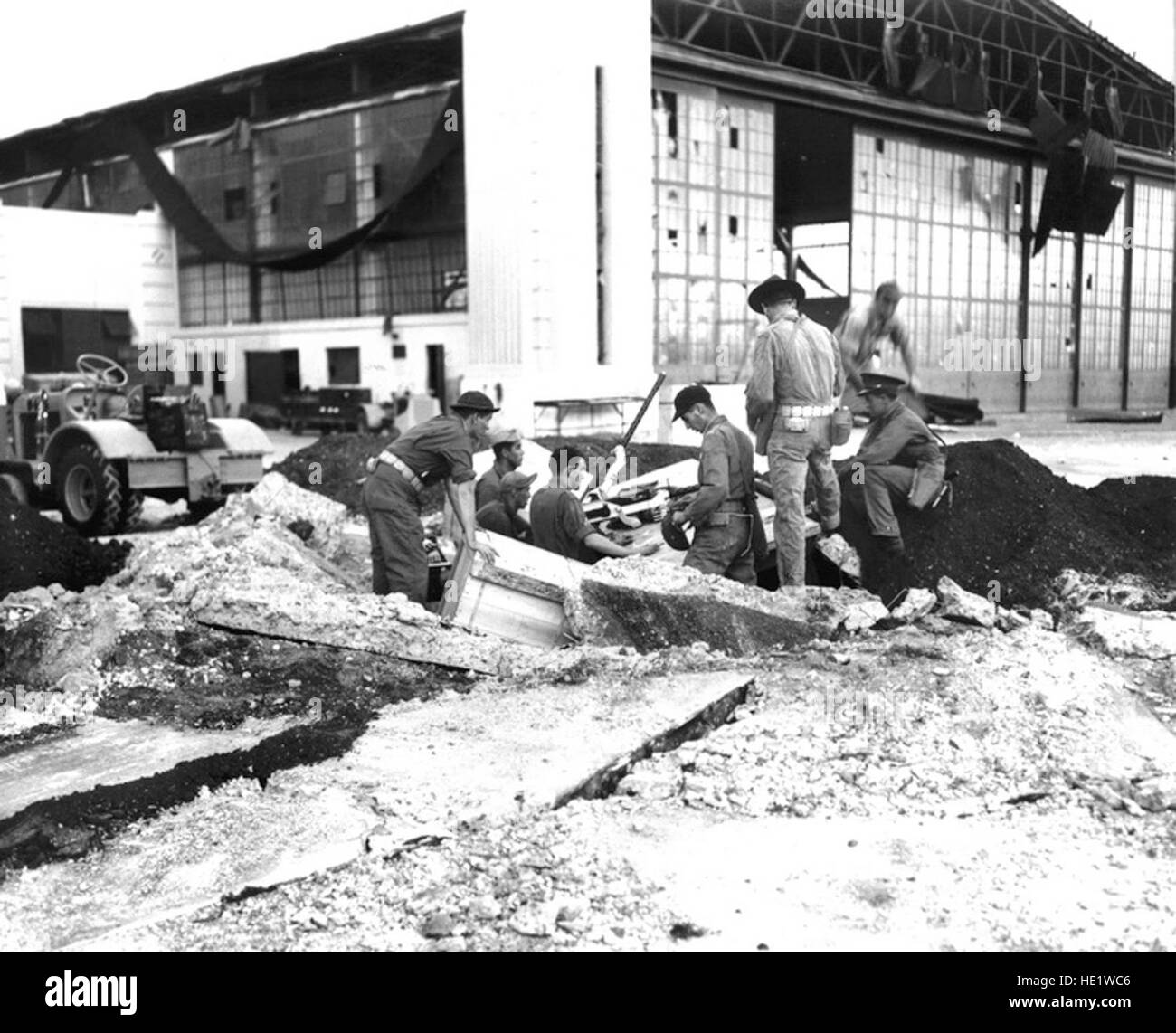 bomb crater between Hangars 15-17 and 11-13 at Hickam Field Stock Photo ...