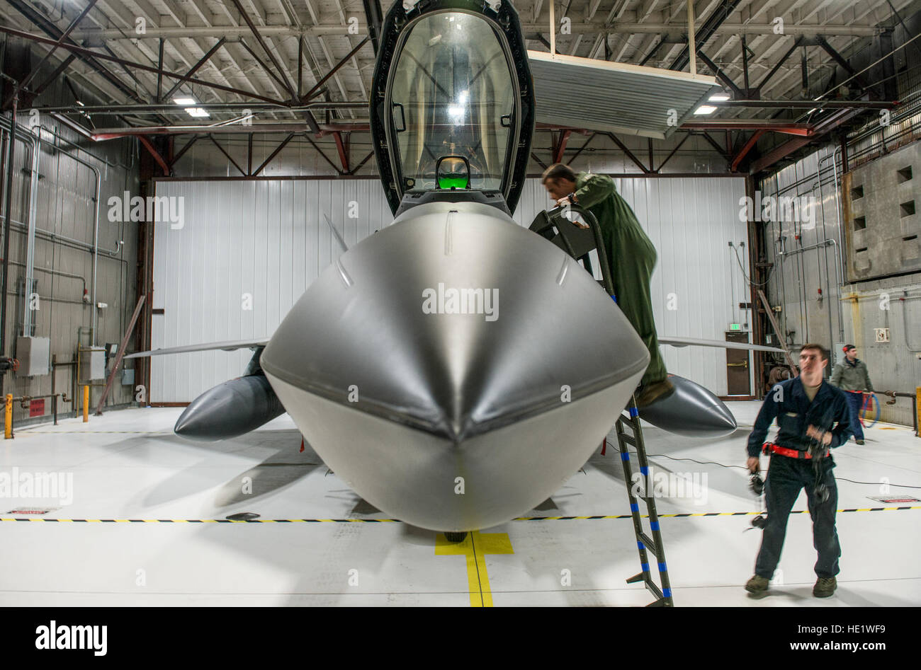 Capt. Dustin Hardwick, 525th Fighter Squadron, climbs in an F-22 Raptor ...