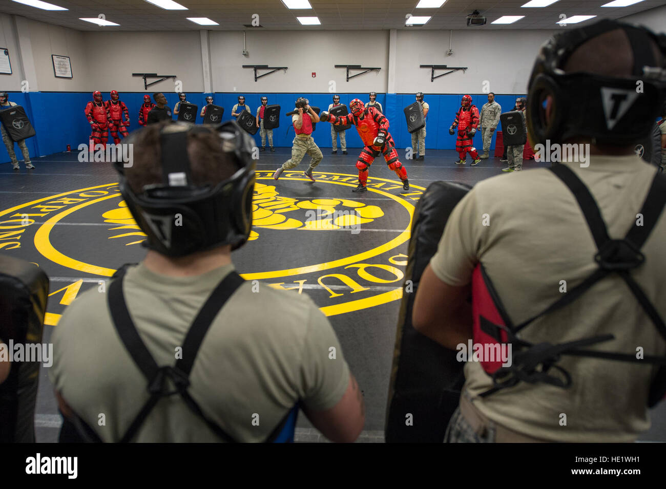 Security Forces patrolmen rotate inside of a warrior circle attempting ...