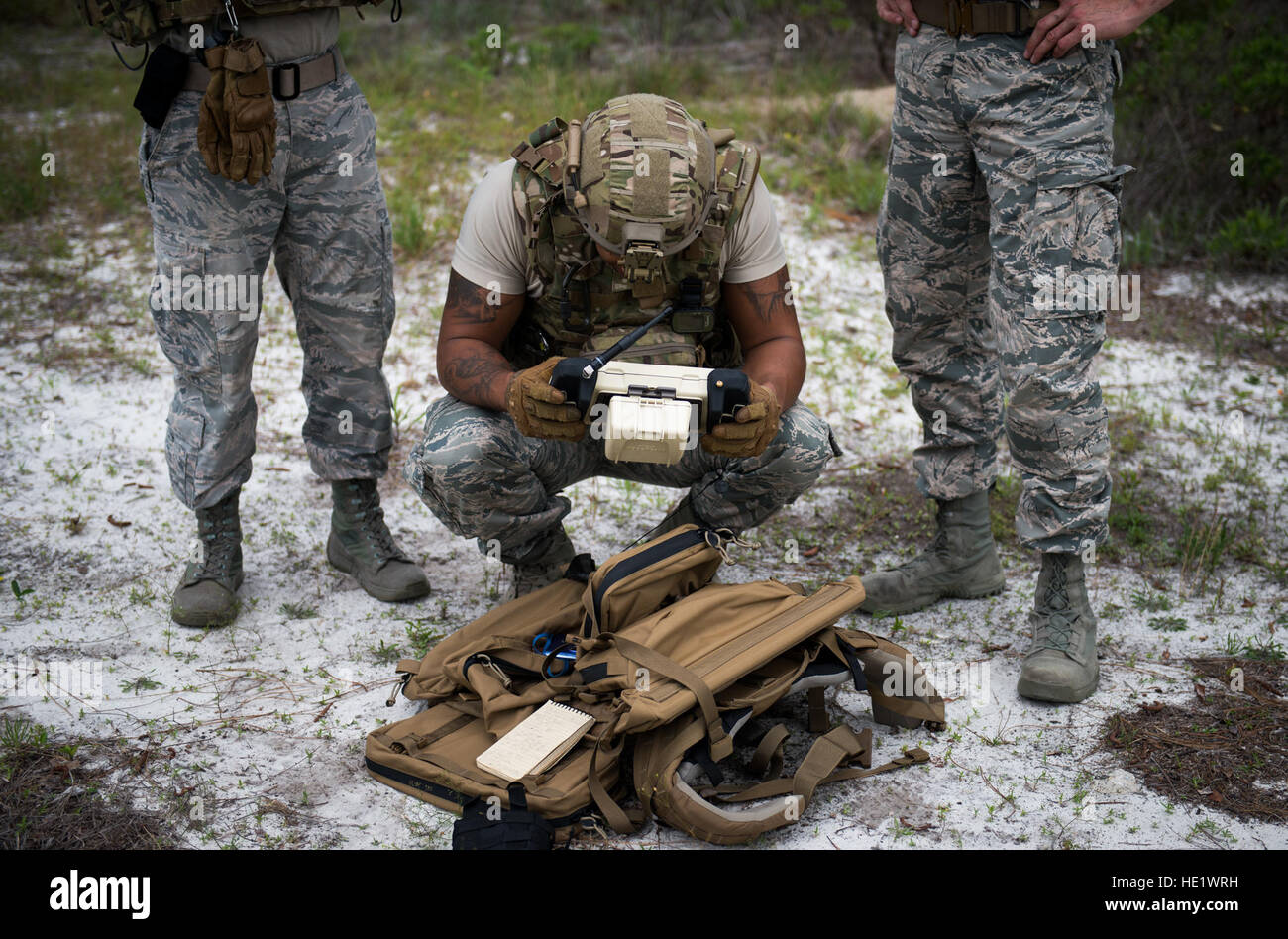 As Senior Airman Anthony Deleon left and Staff Sgt. Brian Wirt right ...