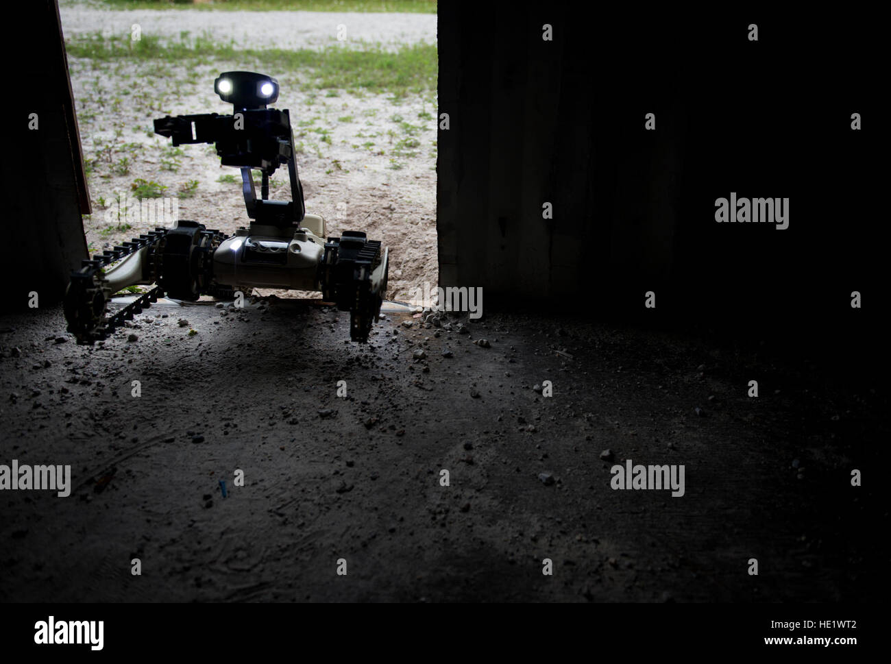 A remotely controlled Micro Tactical Ground Robot is maneuvered so its ...