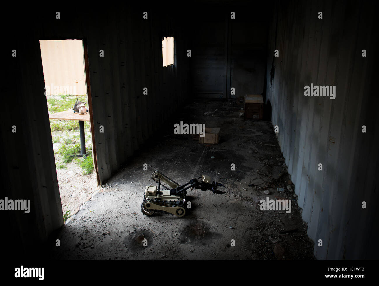 A remotely controlled Micro Tactical Ground Robot is maneuvered so its ...