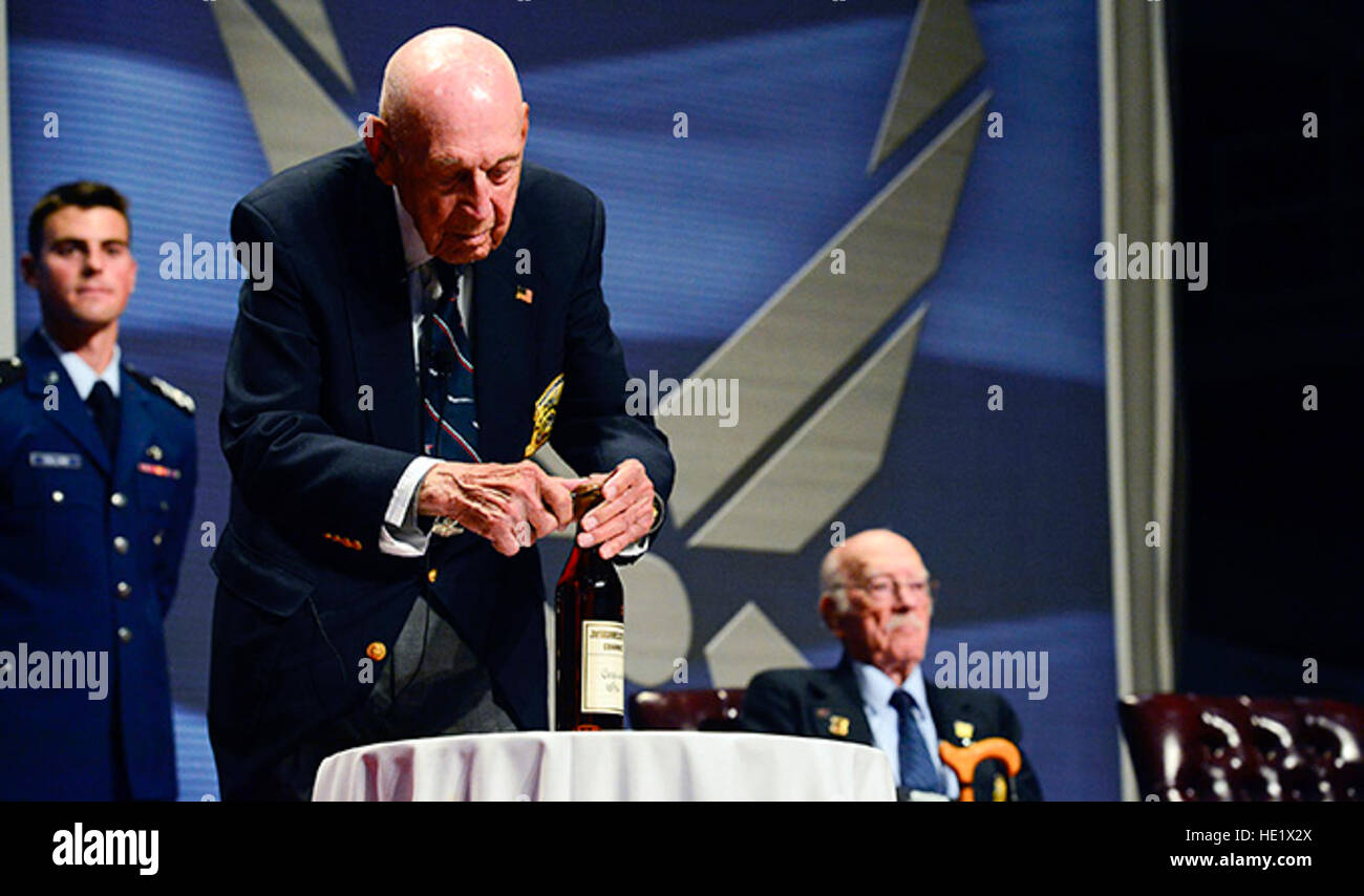 Retired Lt. Col. Richard “Dick” E. Cole opens the 1896 bottle of cognac ...