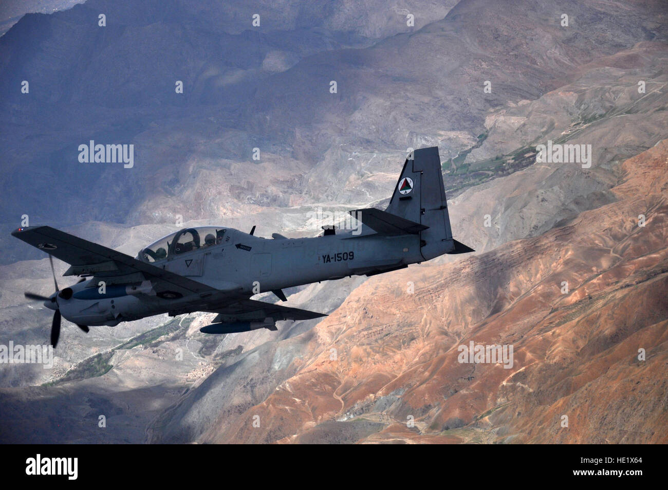 An A-29 Super Tucano flies over Afghanistan during a training mission ...