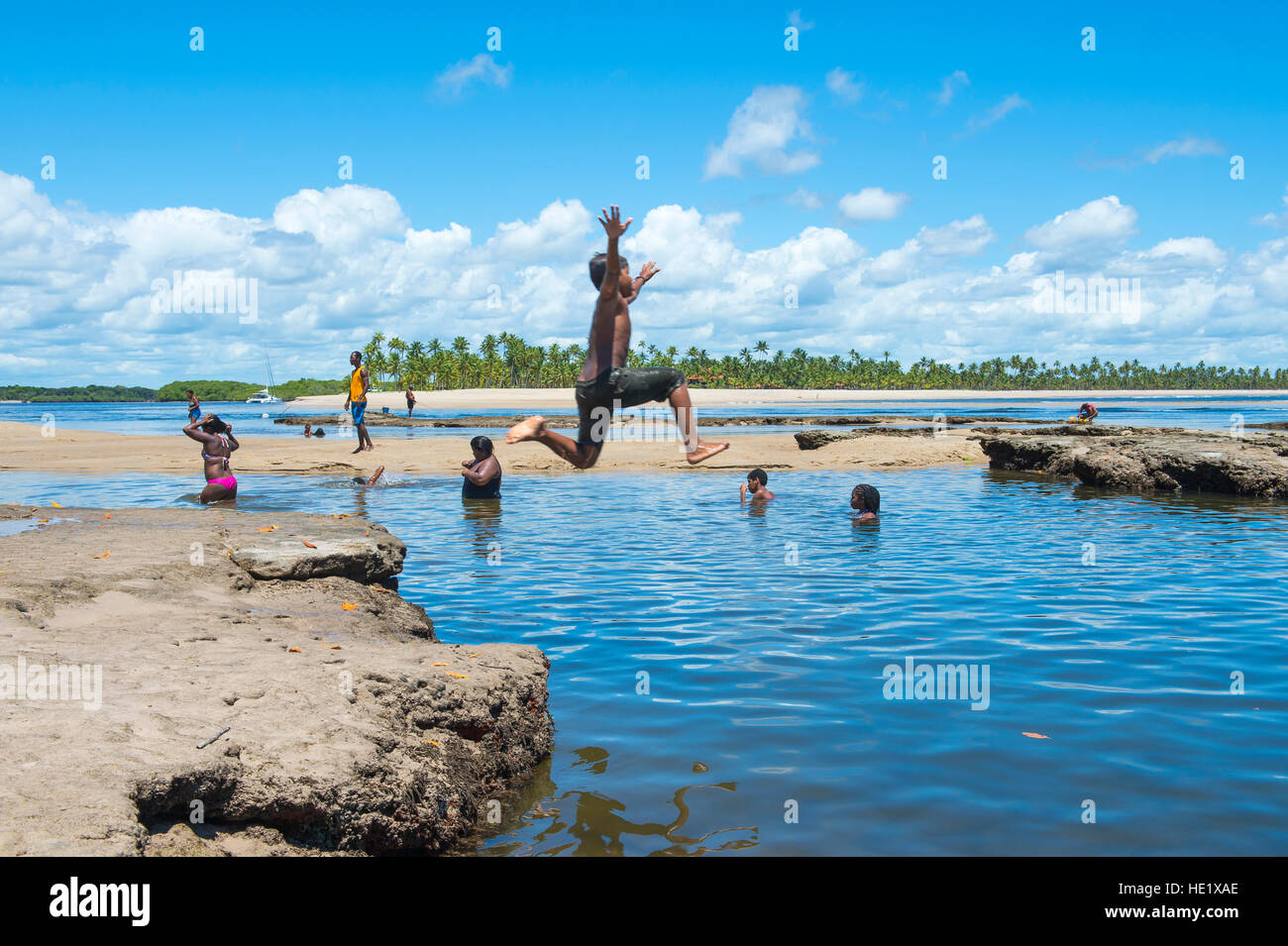 BAHIA, BRAZIL - FEBRUARY 9, 2016: Brazilians enjoy a soak in the ...