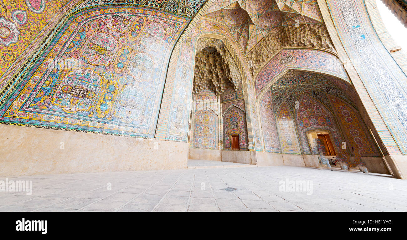 in iran the old mosque and traditional wall tile incision near minaret ...