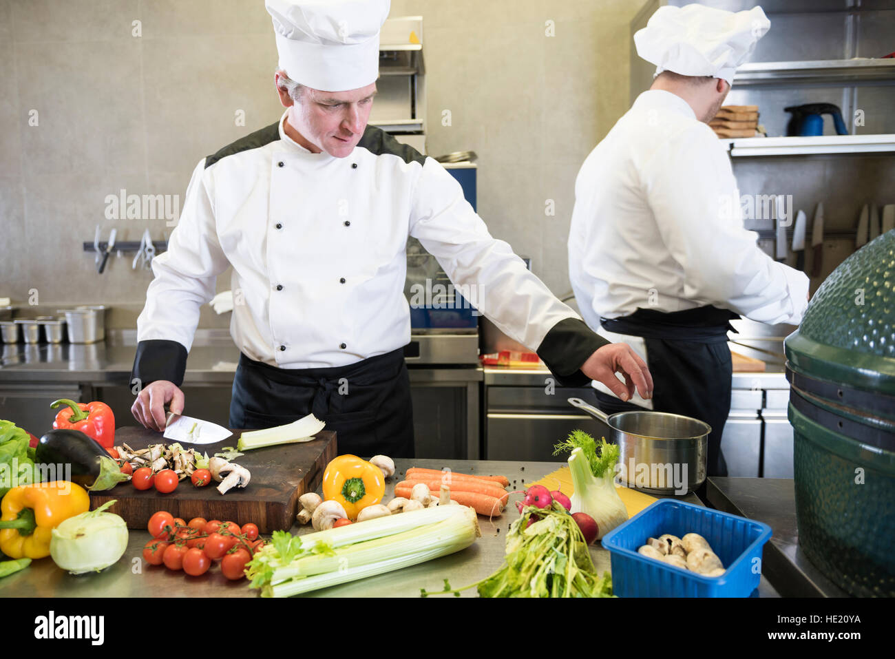 Busy day at commercial kitchen Stock Photo - Alamy
