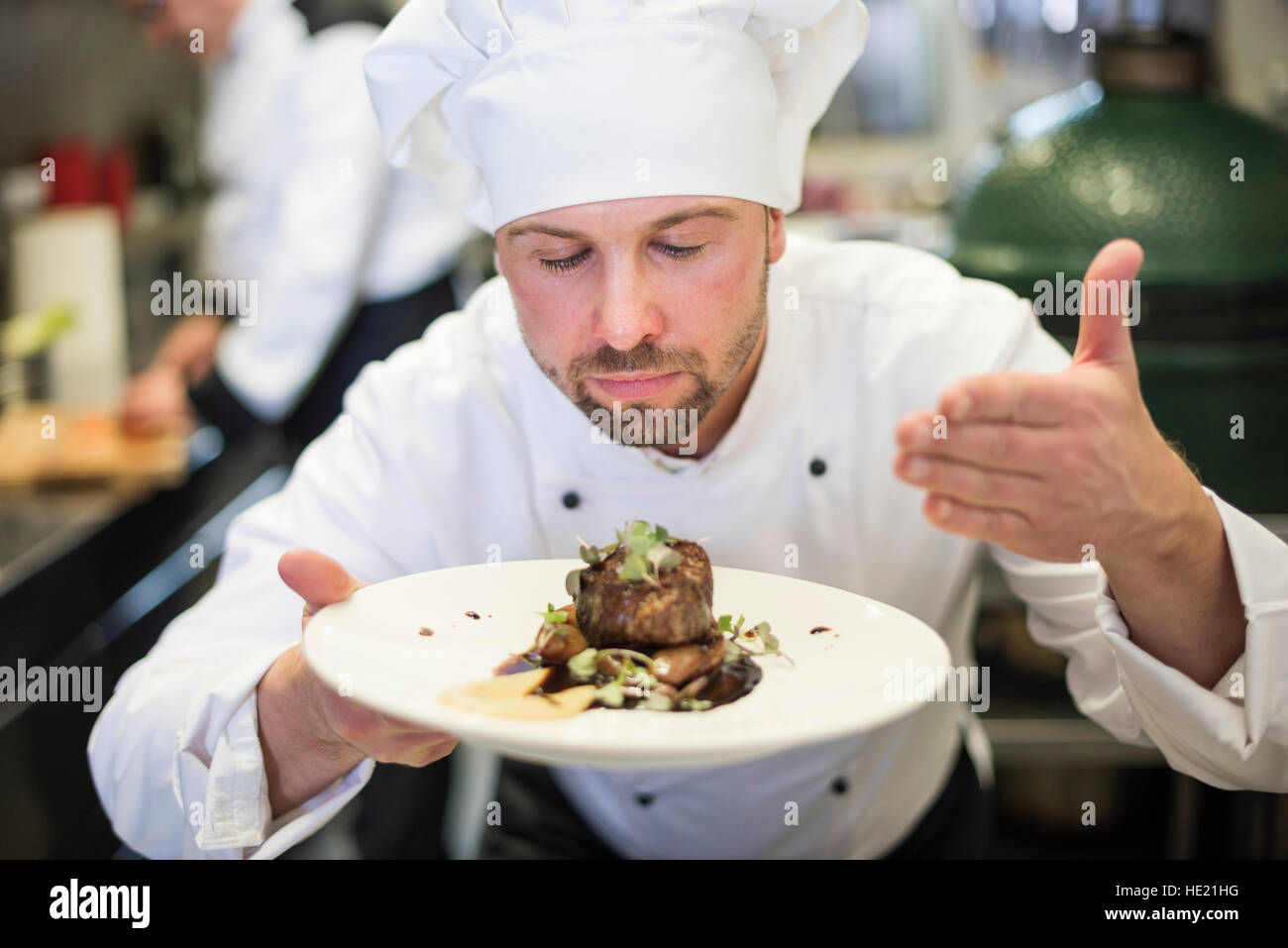 Very pleased of what he's cooked Stock Photo - Alamy