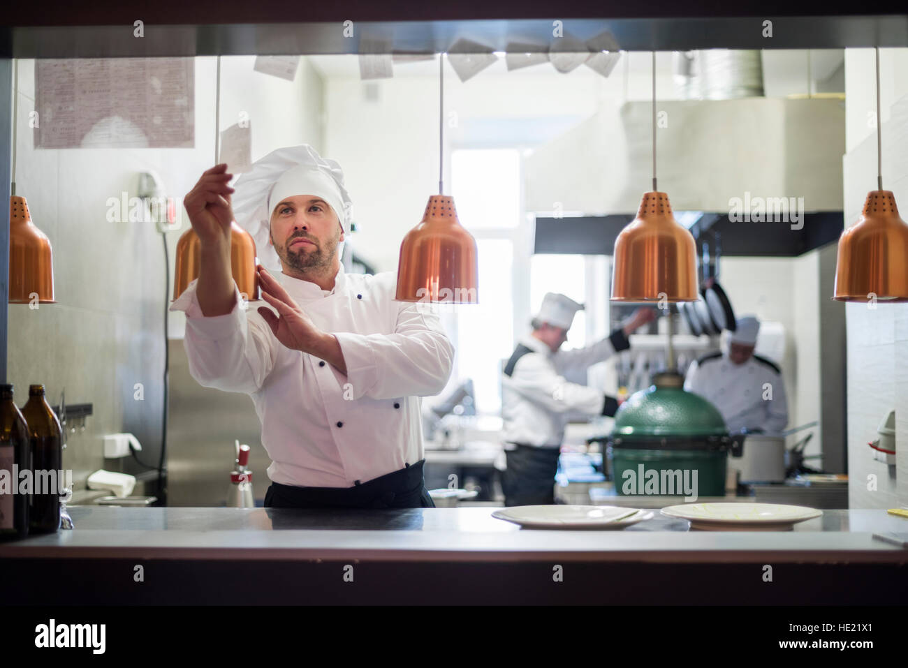 Time to open the kitchen for quests Stock Photo - Alamy