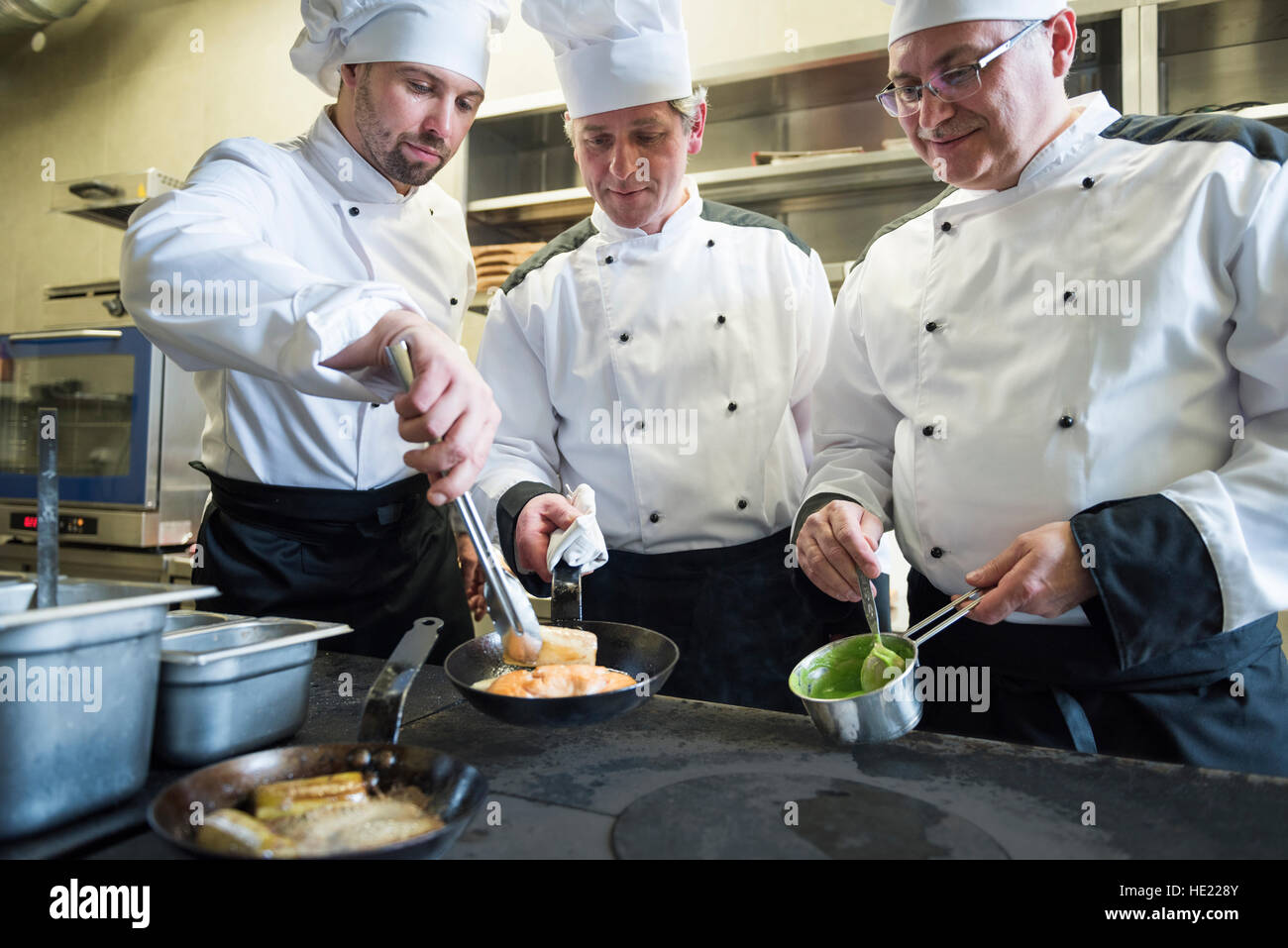 Teamwork is a guarantee of good food Stock Photo - Alamy