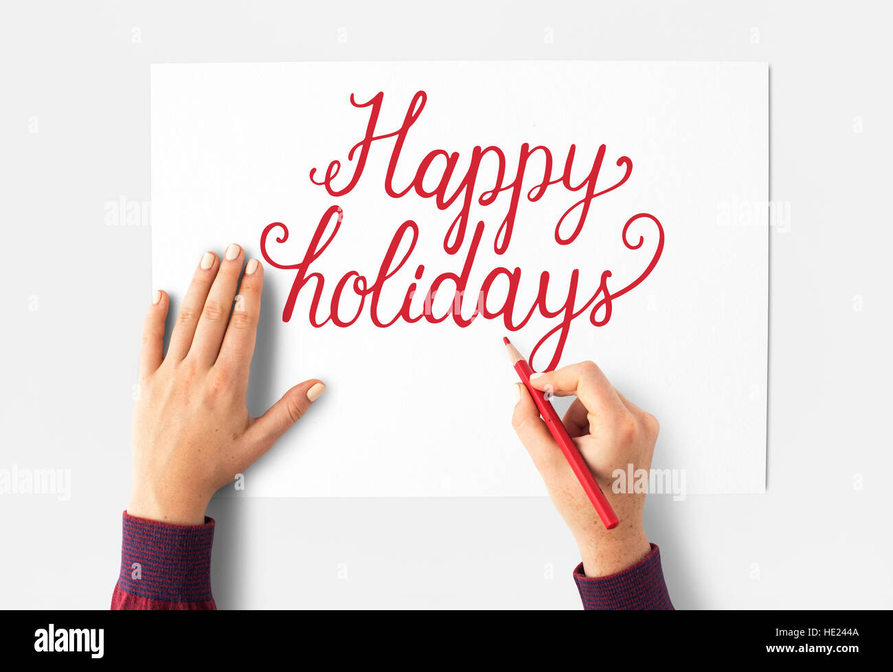 Happy holidays cheerful greeting word Stock Photo - Alamy