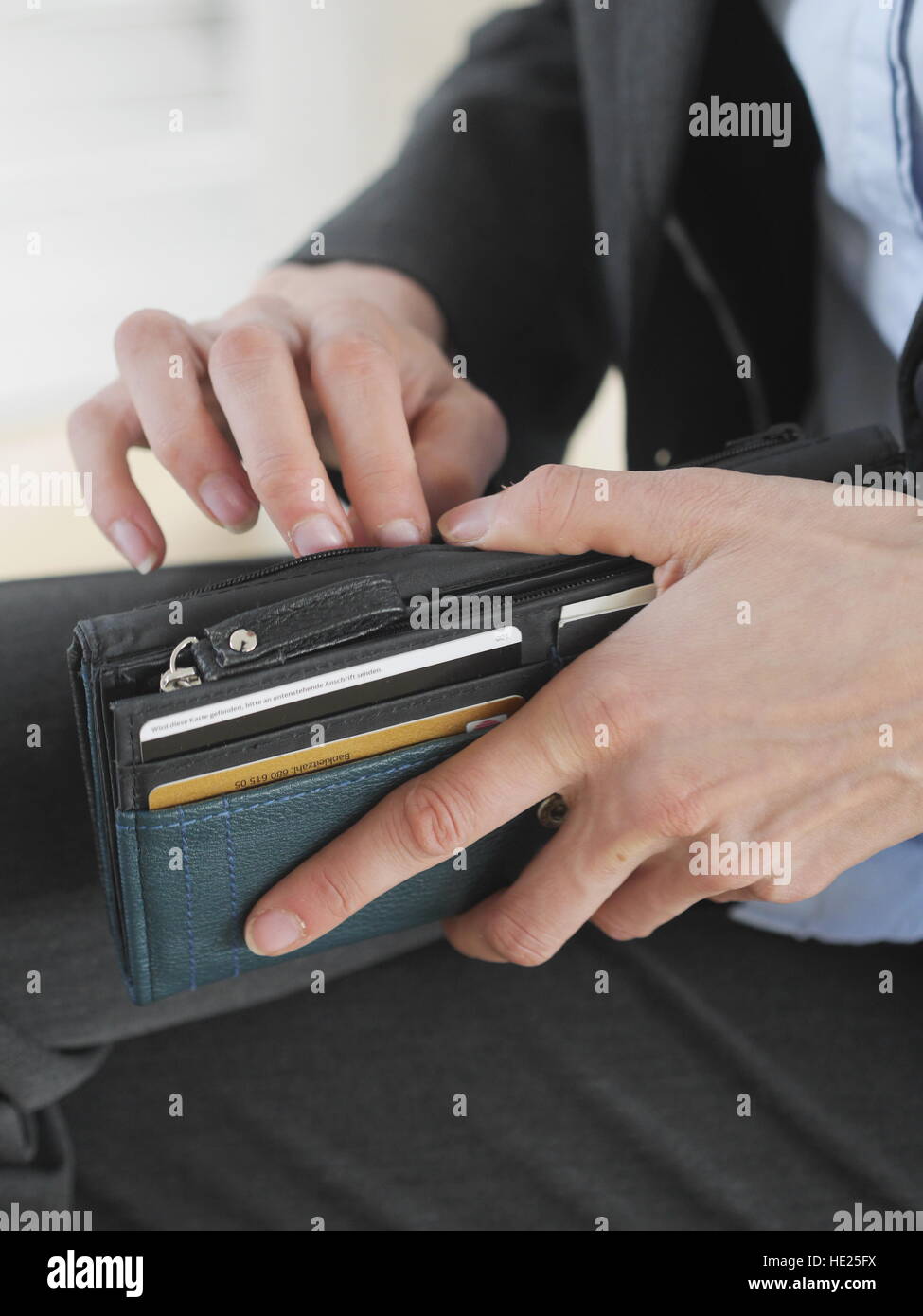 Money in wallet hi-res stock photography and images - Alamy