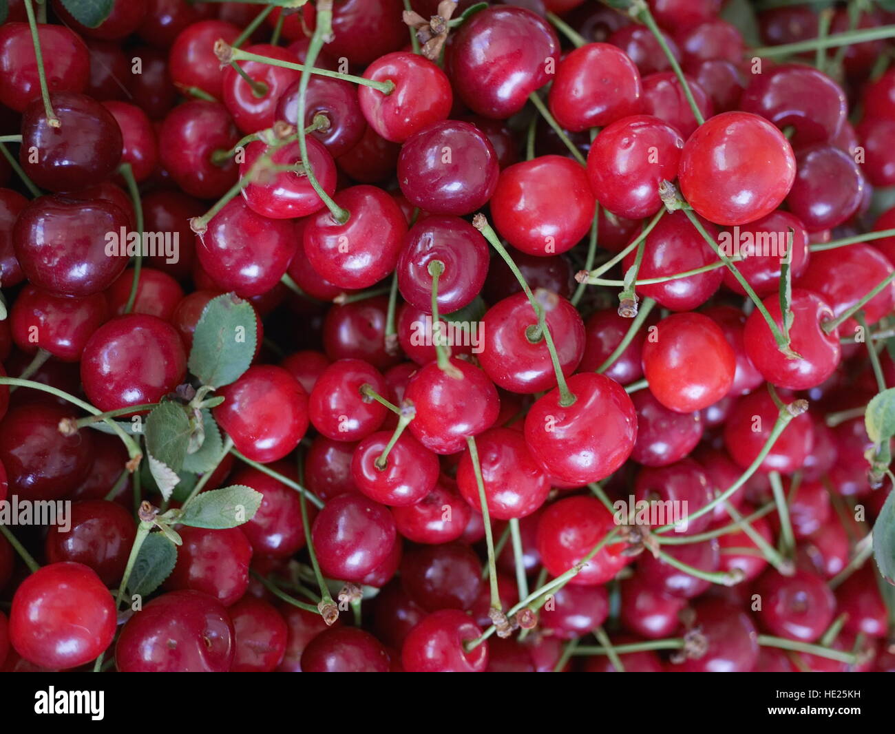 Raw red organic cherries hi-res stock photography and images - Alamy