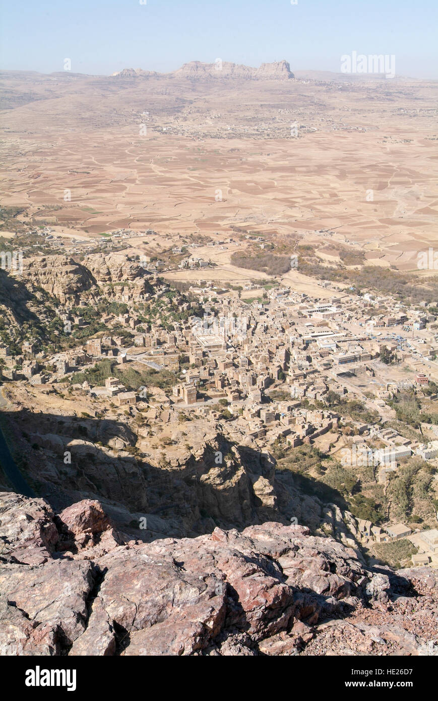 Red rocks and decorated old houses, overview of Shibam valley seen from ...