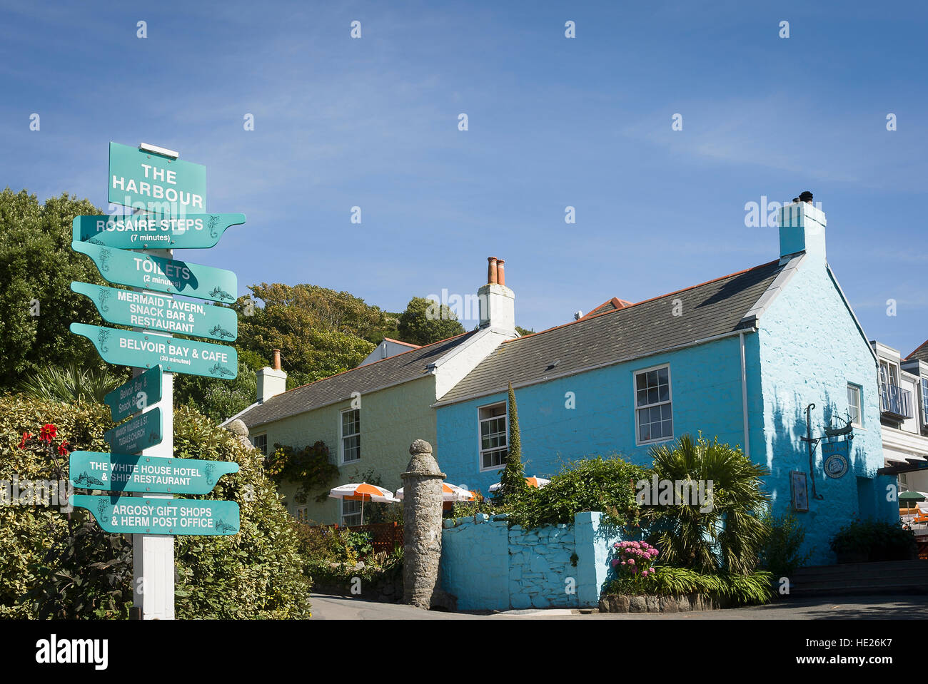 Signpost and Ship Inn on Herm Island in the Channel Islands UK Stock ...