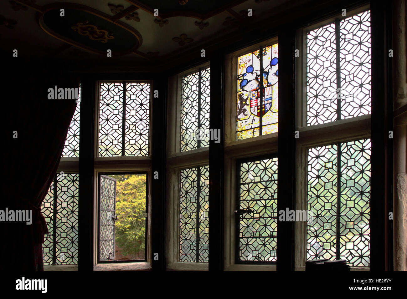 Leaded engraved medieval windows in the Great Chamber of New Hall Manor ...
