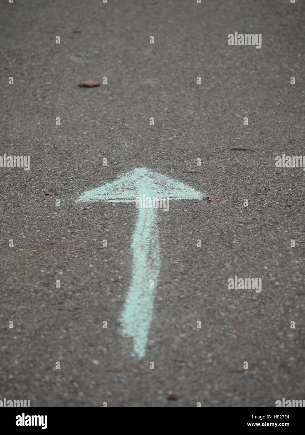 chalk arrow on road Stock Photo - Alamy