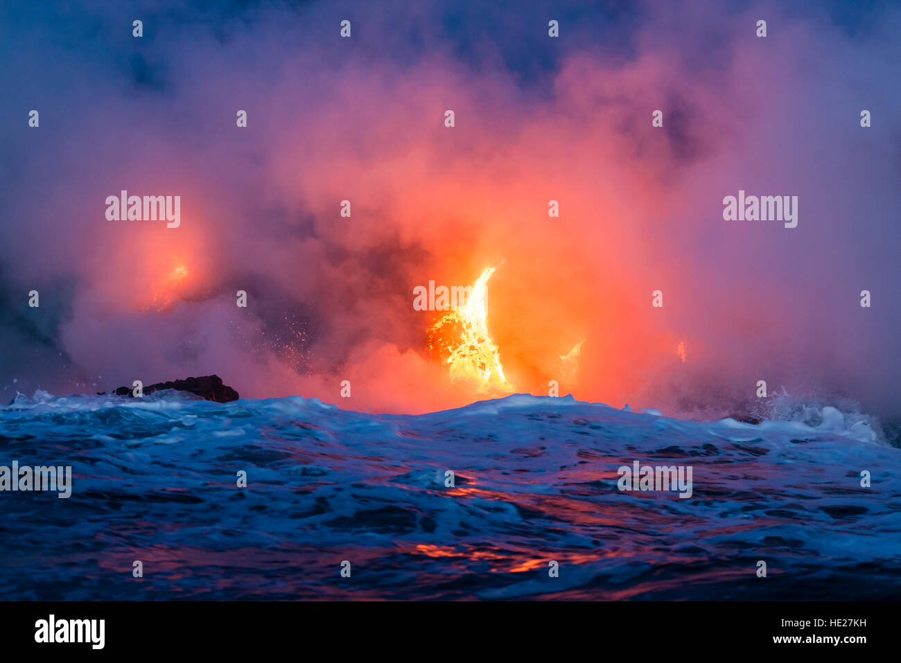 Lava flow entering the ocean at dawn, Hawaii Volcanoes National Park ...