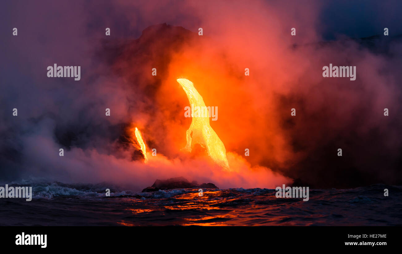 Lava flow entering the ocean at dawn, Hawaii Volcanoes National Park, The Big Island, Hawaii USA ...