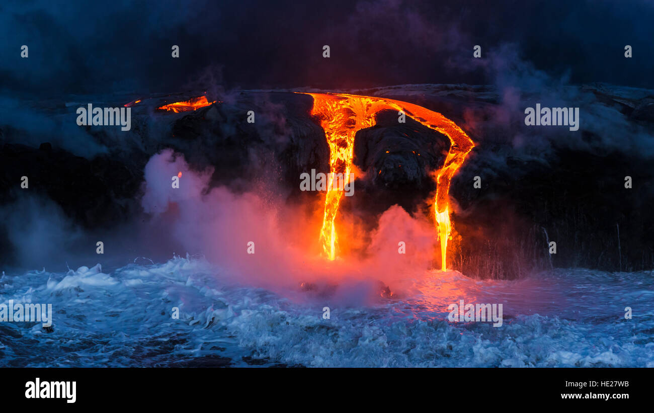 Lava flow entering the ocean at dawn, Hawaii Volcanoes National Park ...