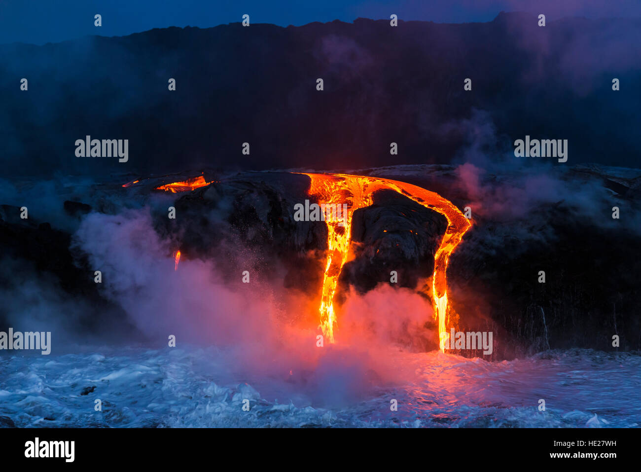 Lava flow entering the ocean at dawn, Hawaii Volcanoes National Park ...