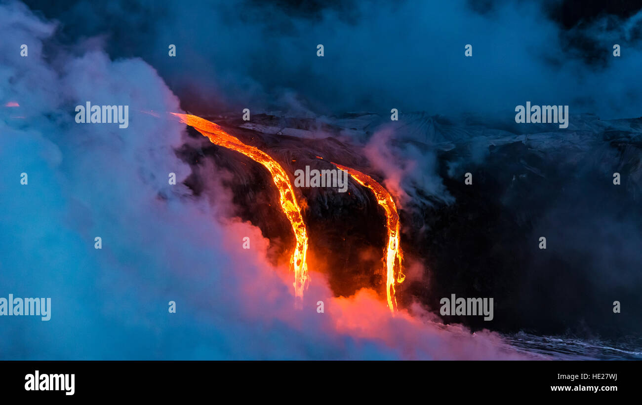 Lava flow entering the ocean at dawn, Hawaii Volcanoes National Park ...