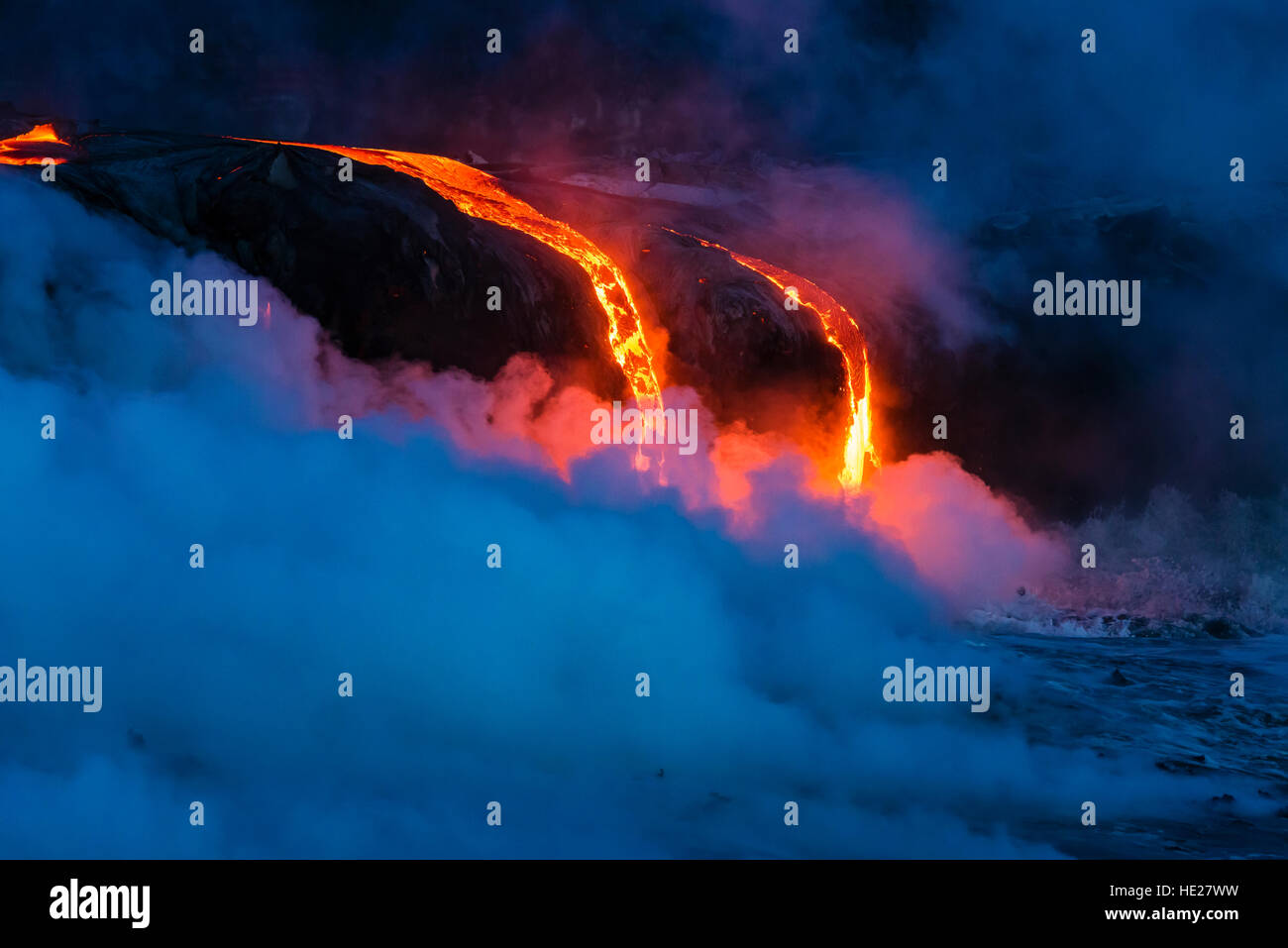Lava flow entering the ocean at dawn, Hawaii Volcanoes National Park ...