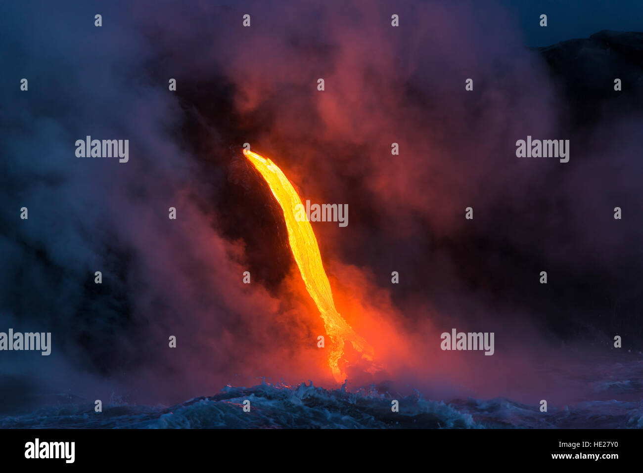 Lava flow entering the ocean at dawn, Hawaii Volcanoes National Park, The Big Island, Hawaii USA ...
