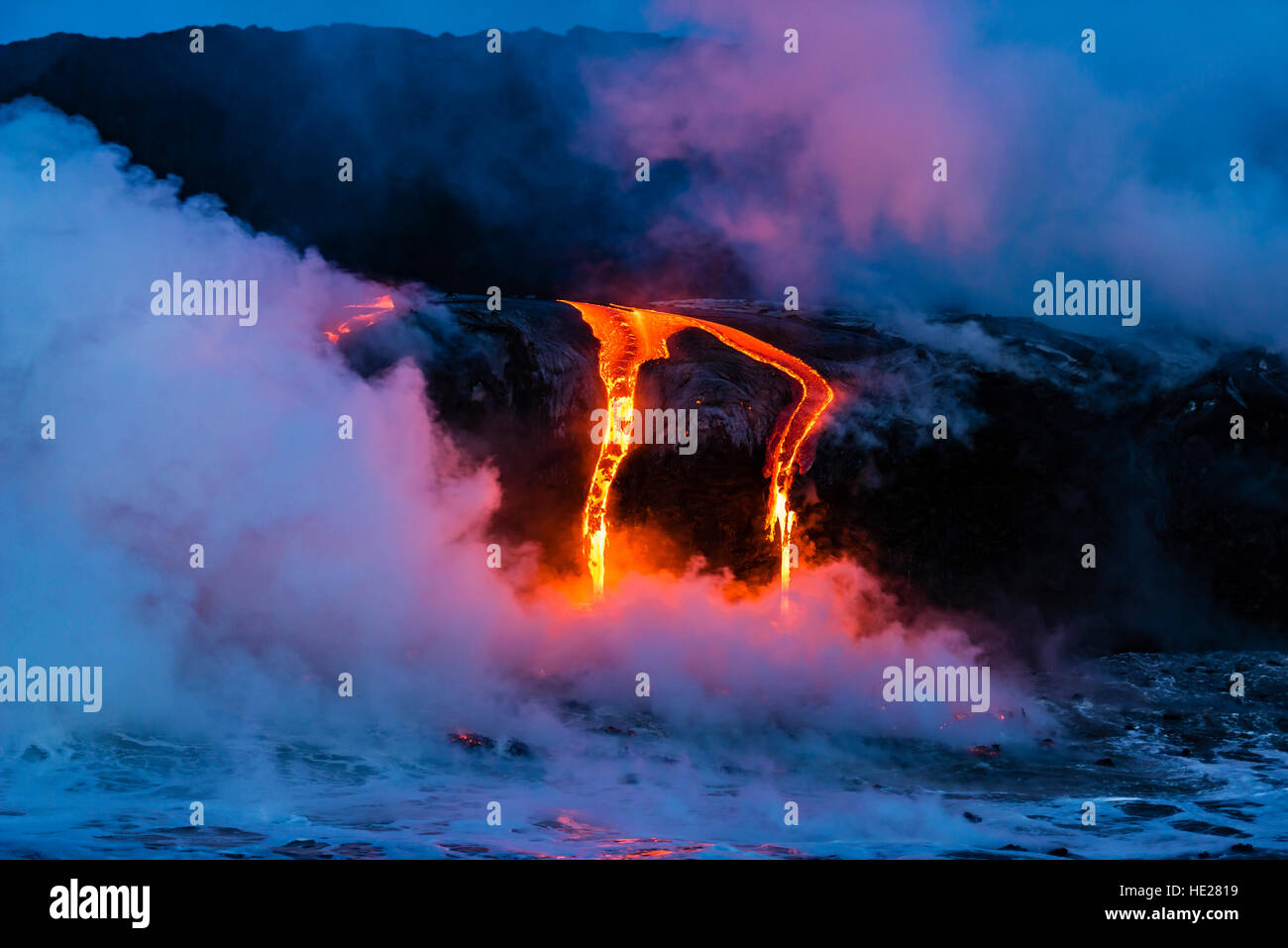 Lava flow entering the ocean at dawn, Hawaii Volcanoes National Park ...