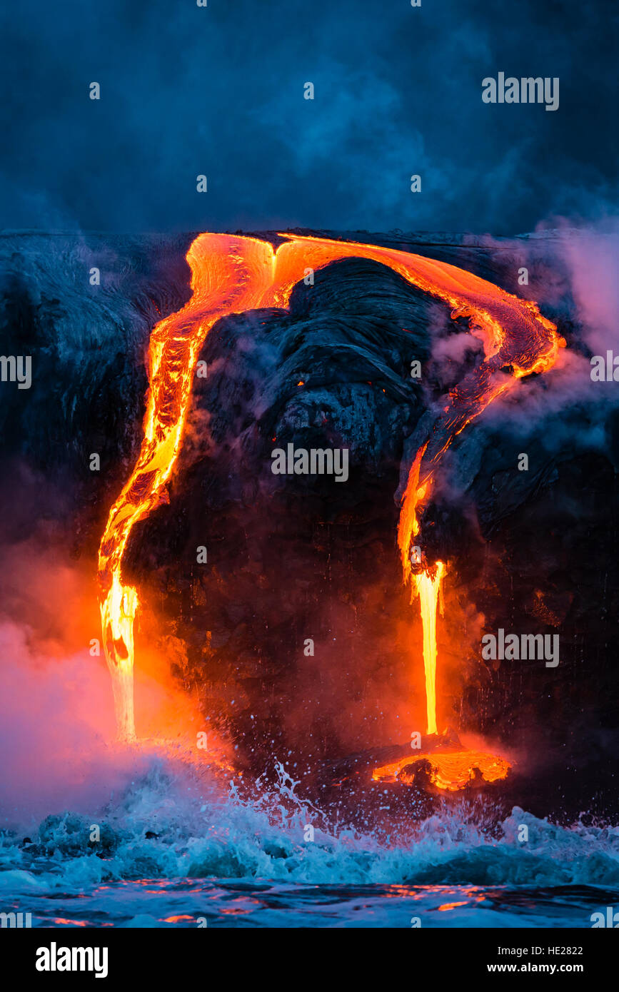 Lava flow entering the ocean at dawn, Hawaii Volcanoes National Park, The Big Island, Hawaii USA ...