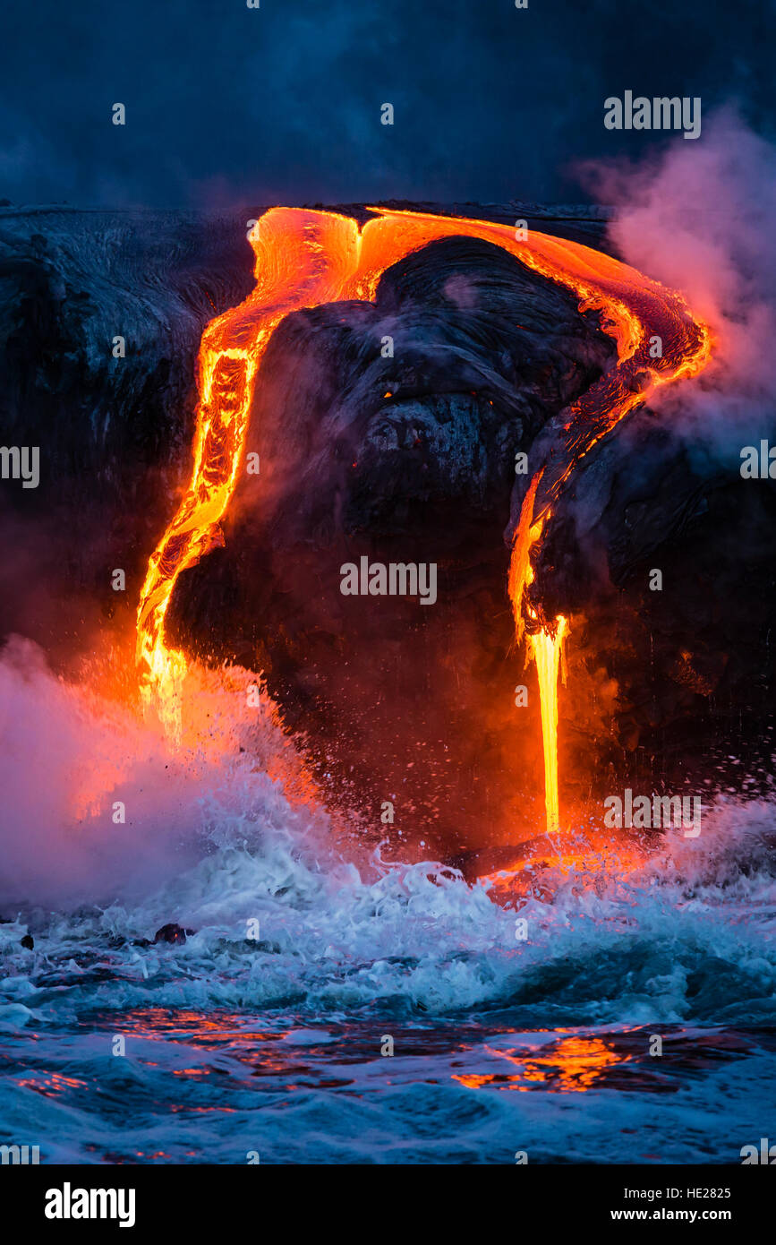 Lava flow entering the ocean at dawn, Hawaii Volcanoes National Park ...