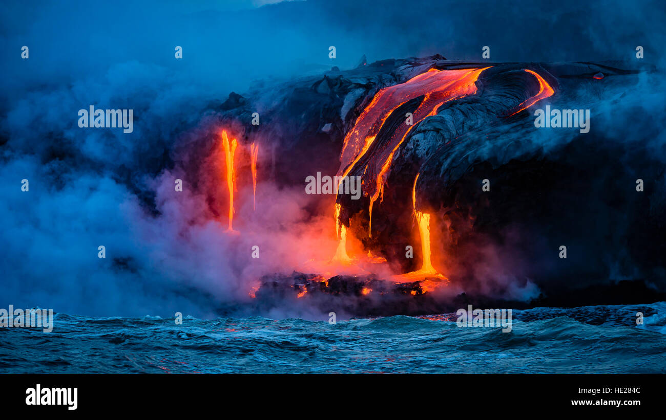Lava flow entering the ocean at dawn, Hawaii Volcanoes National Park ...