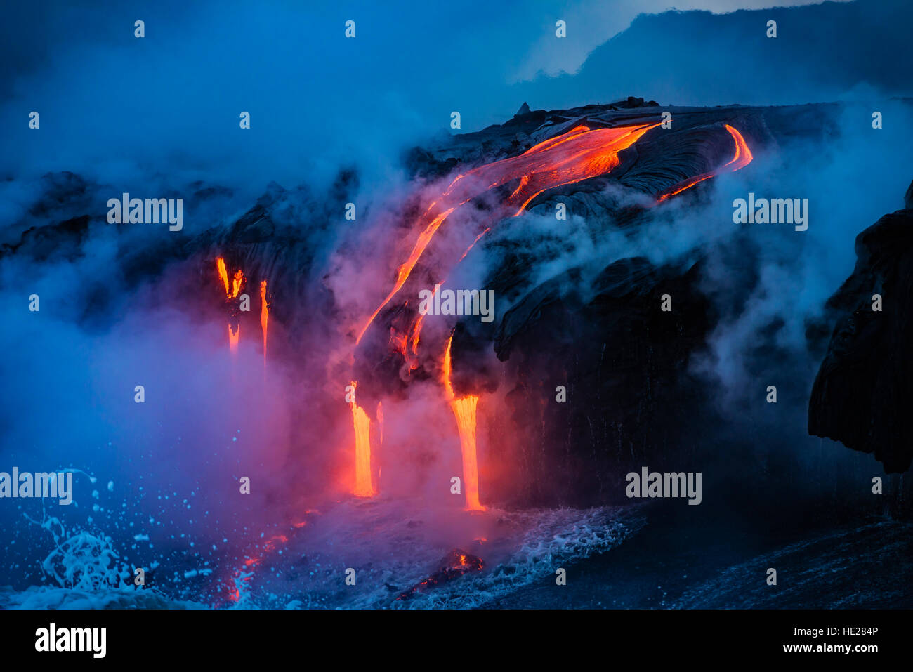 Lava flow entering the ocean at dawn, Hawaii Volcanoes National Park ...
