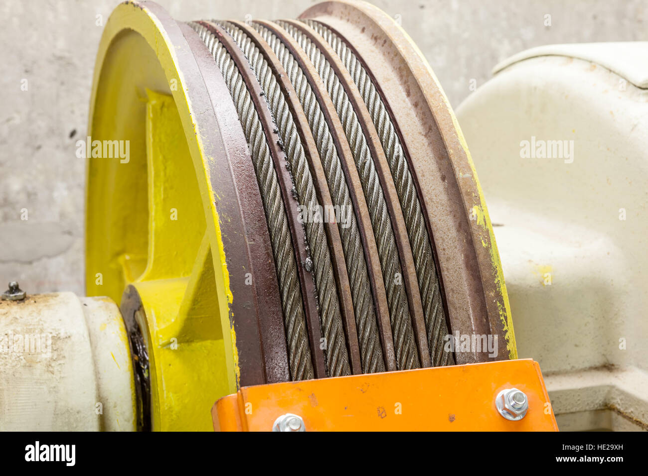 iron cables on a wheel of a motor of the elevator Stock Photo - Alamy
