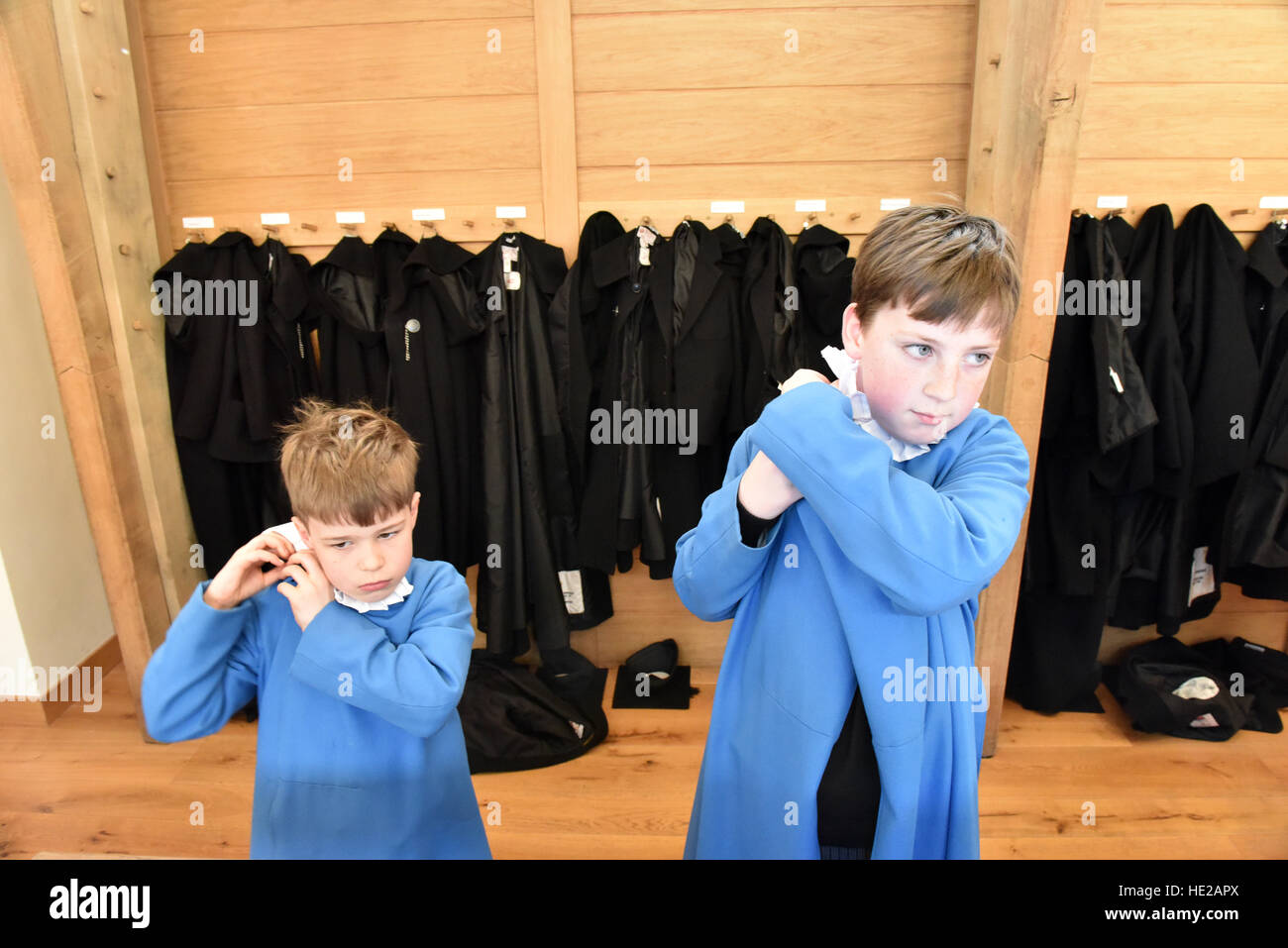 Putting on cassock hi-res stock photography and images - Alamy