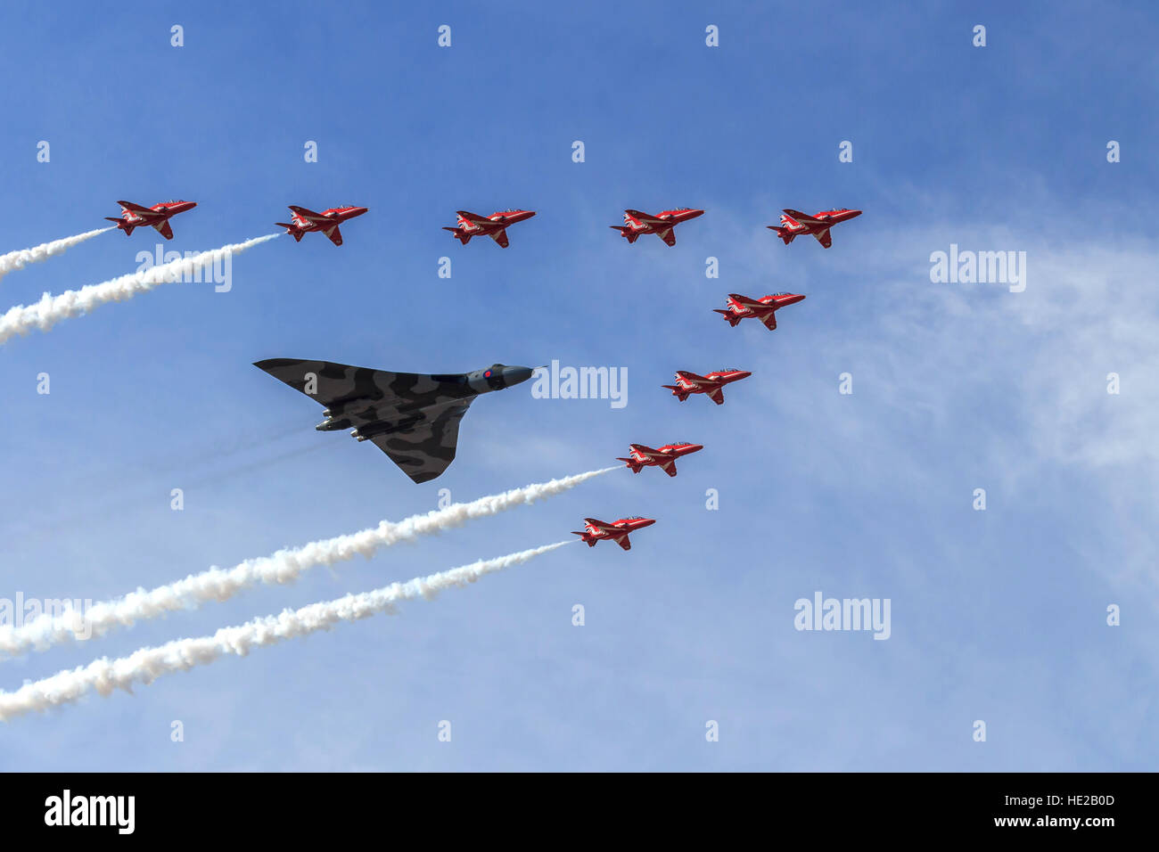 The RAF Avro Vulcan Bomber XH558 with The Red Arrows Vulcan tribute ...