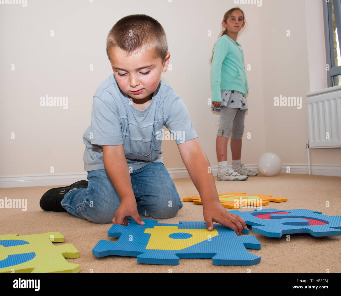 Children settling hi-res stock photography and images - Alamy