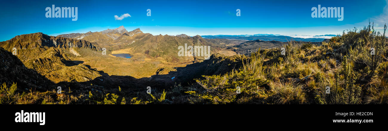 Panoramic photo of mountains and lake in distance during morning in ...