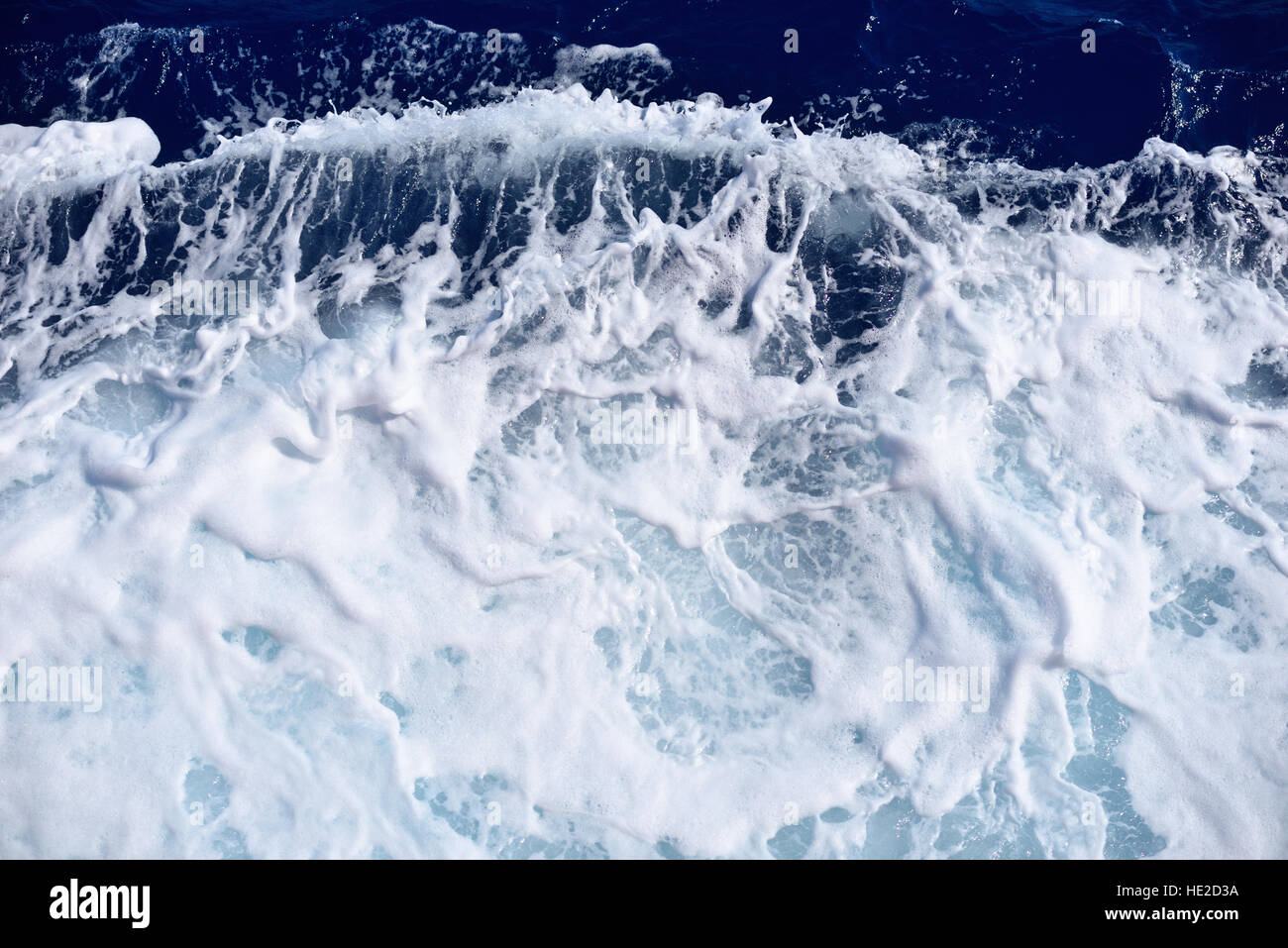 Restless foamy blue sea water from above Stock Photo - Alamy